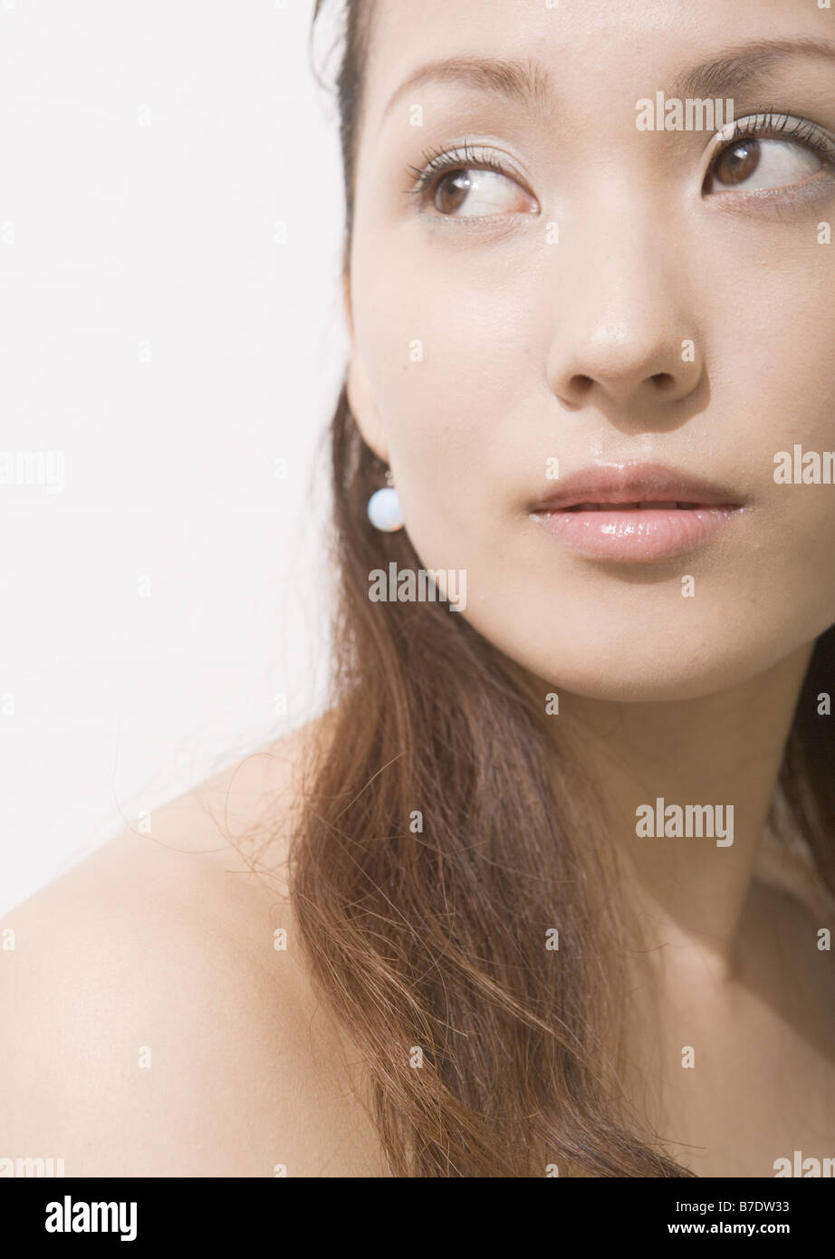 Woman looking away Stock Photo - Alamy