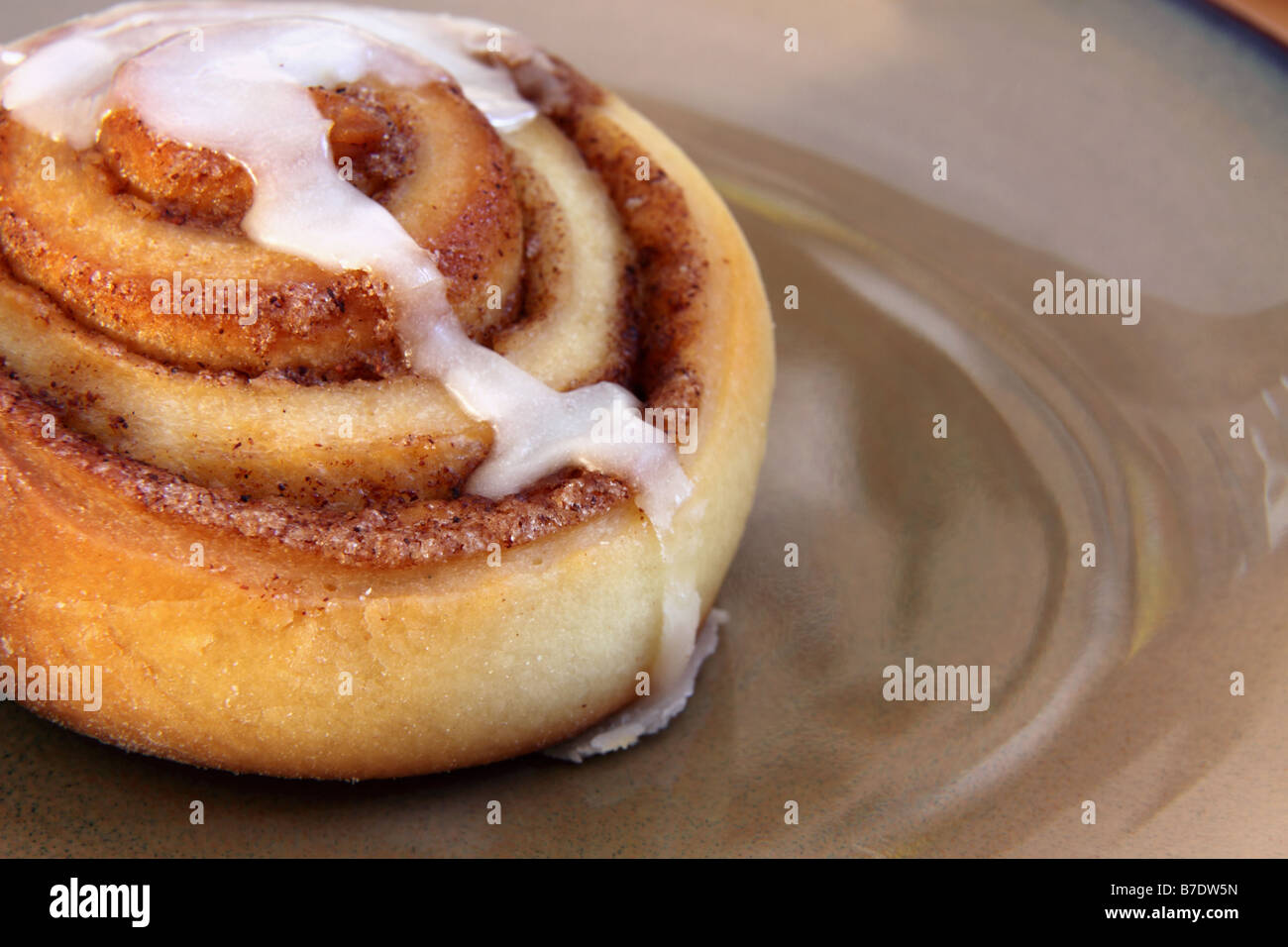 Fresh Cinnamon Bun Stock Photo - Alamy