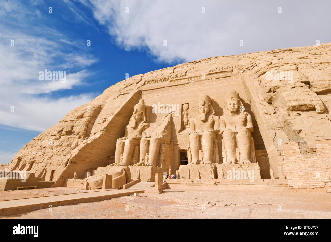giant statues of the pharaoh at the Temple of Rameses II Abu Simbel ...