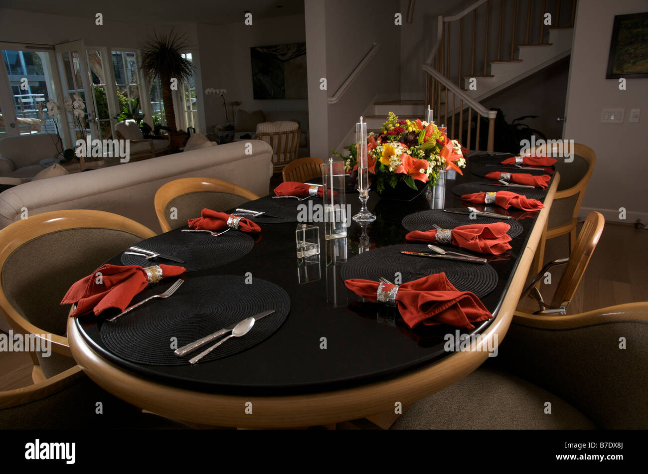 Formal table set for elegant meal in modern home Stock Photo - Alamy