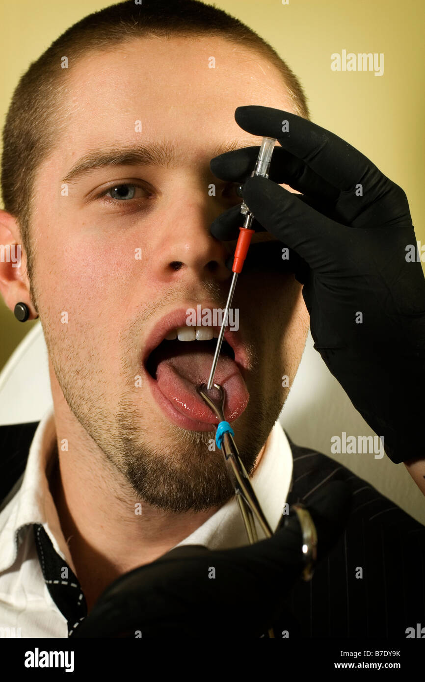 Man With Pierced Tongue High Resolution Stock Photography and Images ...