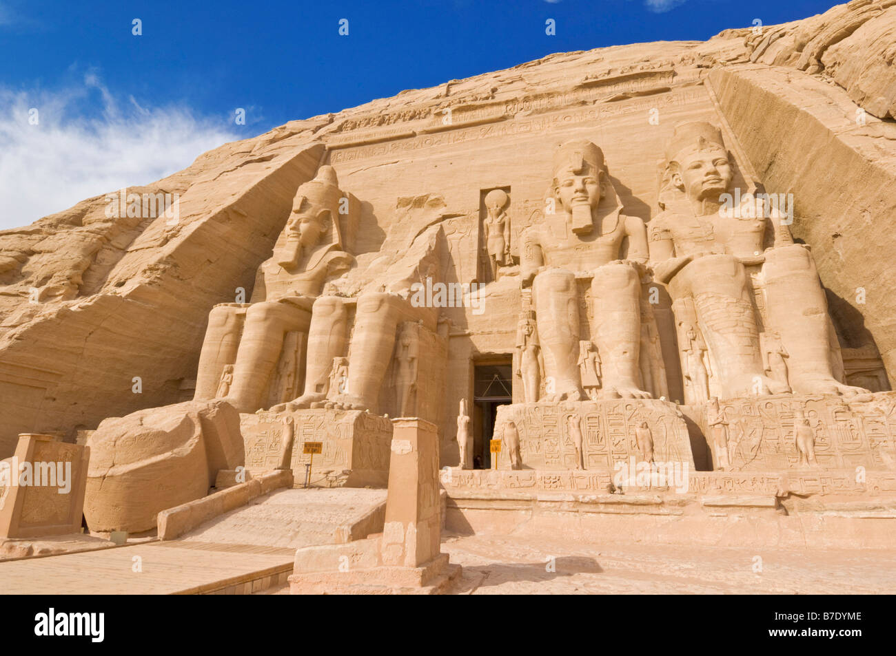 giant statues of the pharaoh at the Temple of Rameses II Abu Simbel ...