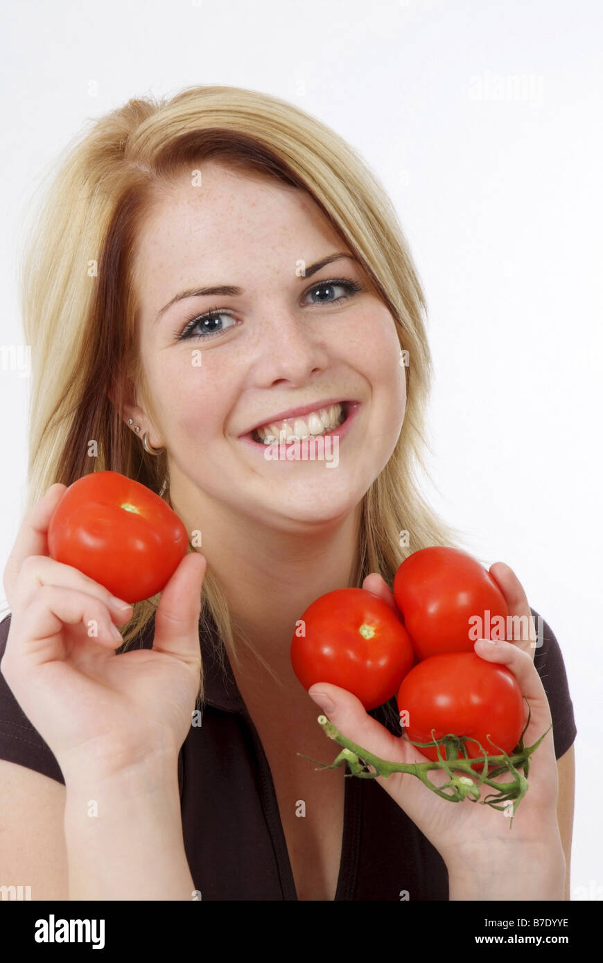 woman with tomatoes Stock Photo - Alamy