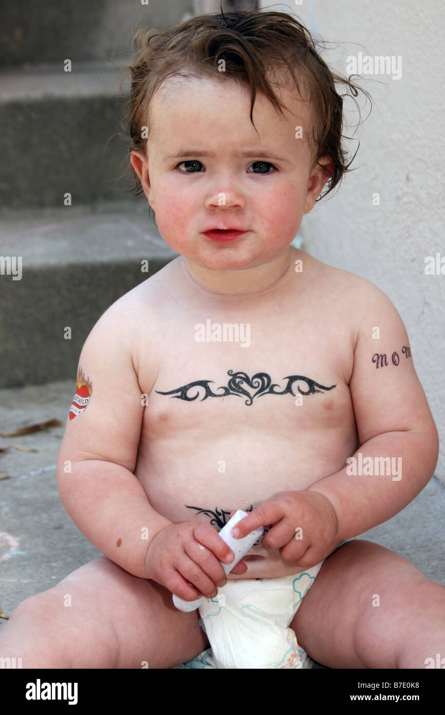 baby6 child with tattoo Stock Photo - Alamy