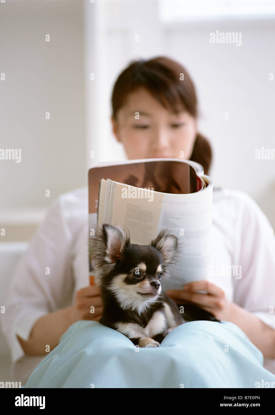 Woman relaxed and reading Stock Photo - Alamy