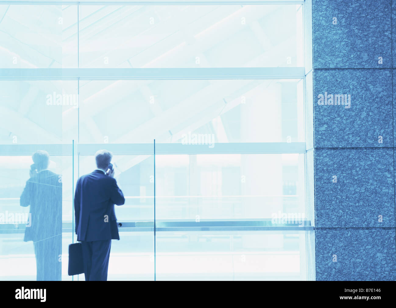 Rear view tall businessman hi-res stock photography and images - Alamy