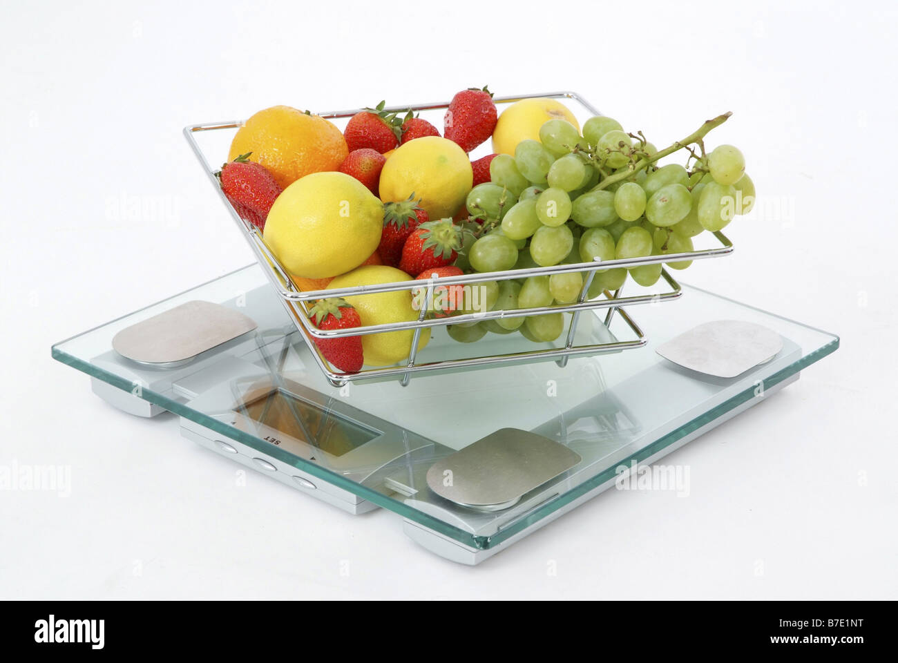 fruit basket on a scale Stock Photo - Alamy
