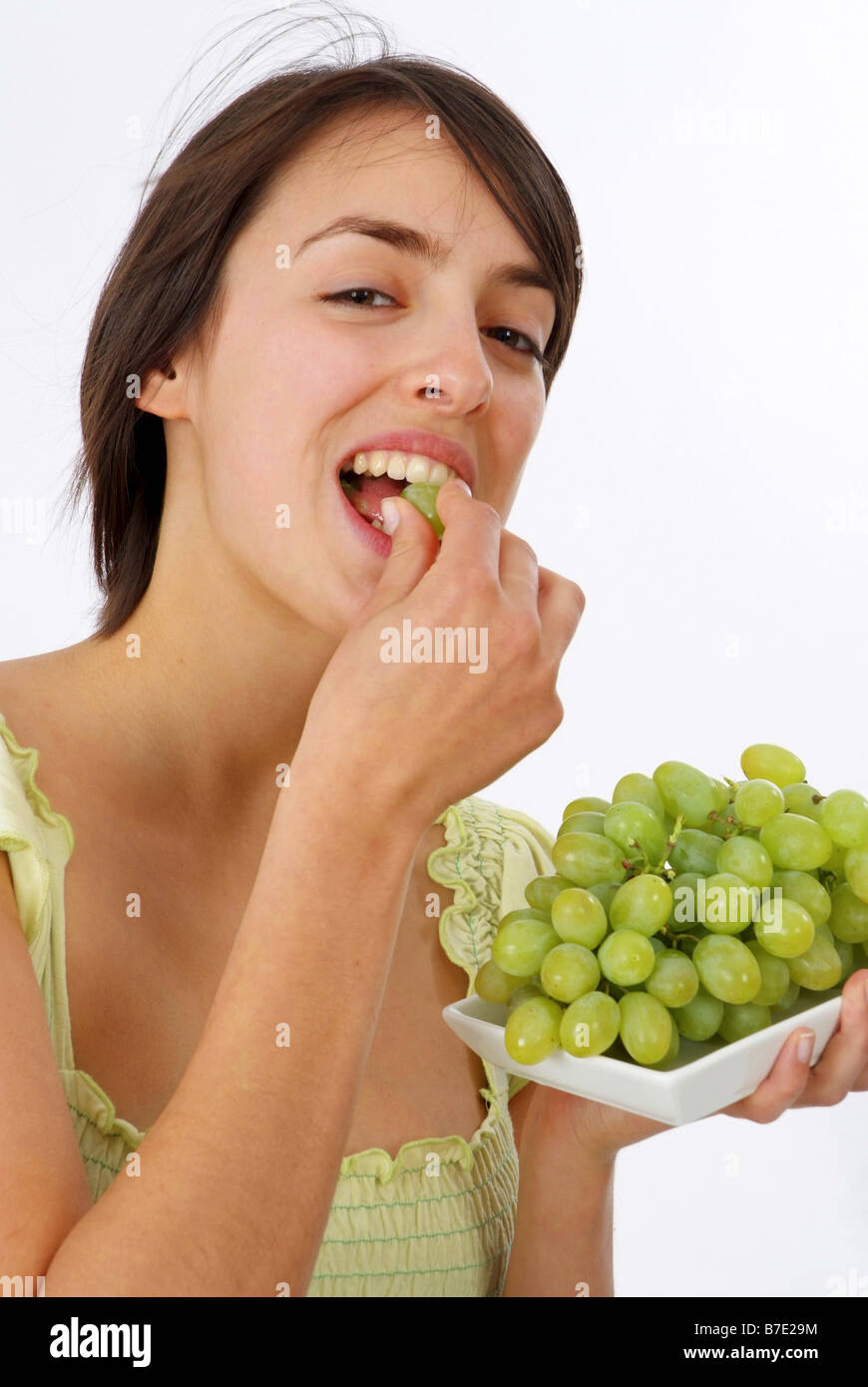 young woman with grapes Stock Photo - Alamy
