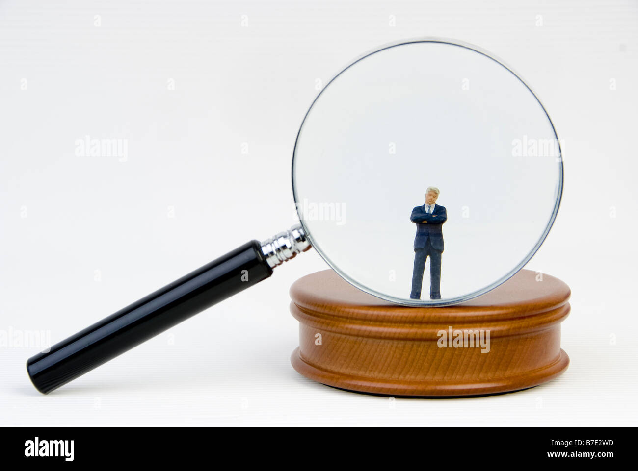 Businessman under magnifying glass hi-res stock photography and images ...