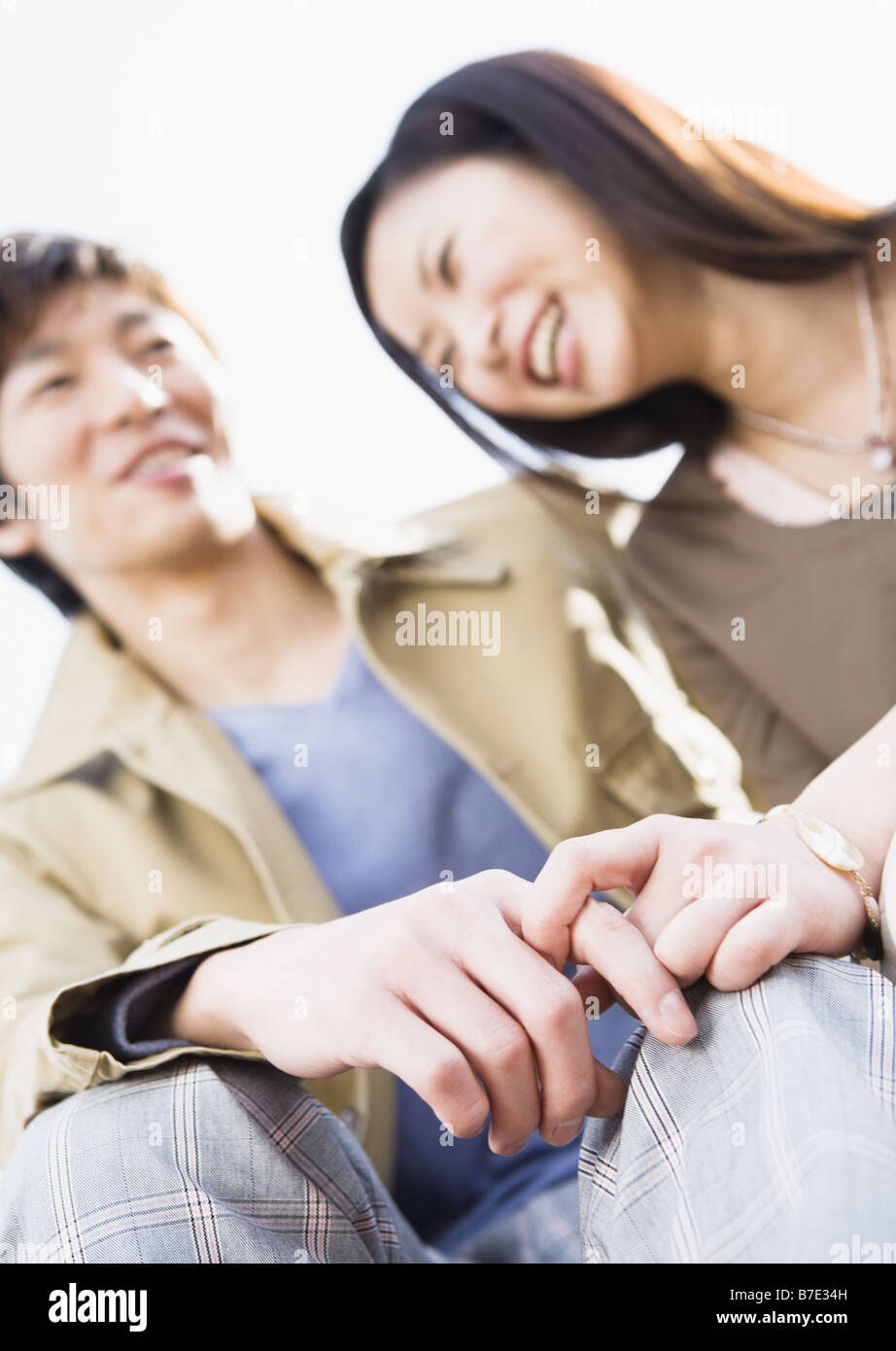 Hand on knee flirt hi-res stock photography and images - Alamy