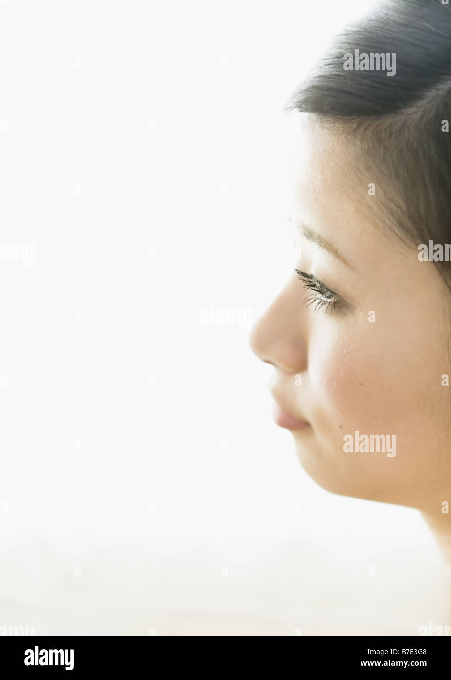 Side face of woman Stock Photo - Alamy