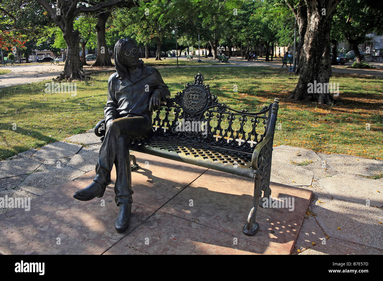 Bronze statue of John Lennon on park bench, Havana, Cuba island, West ...