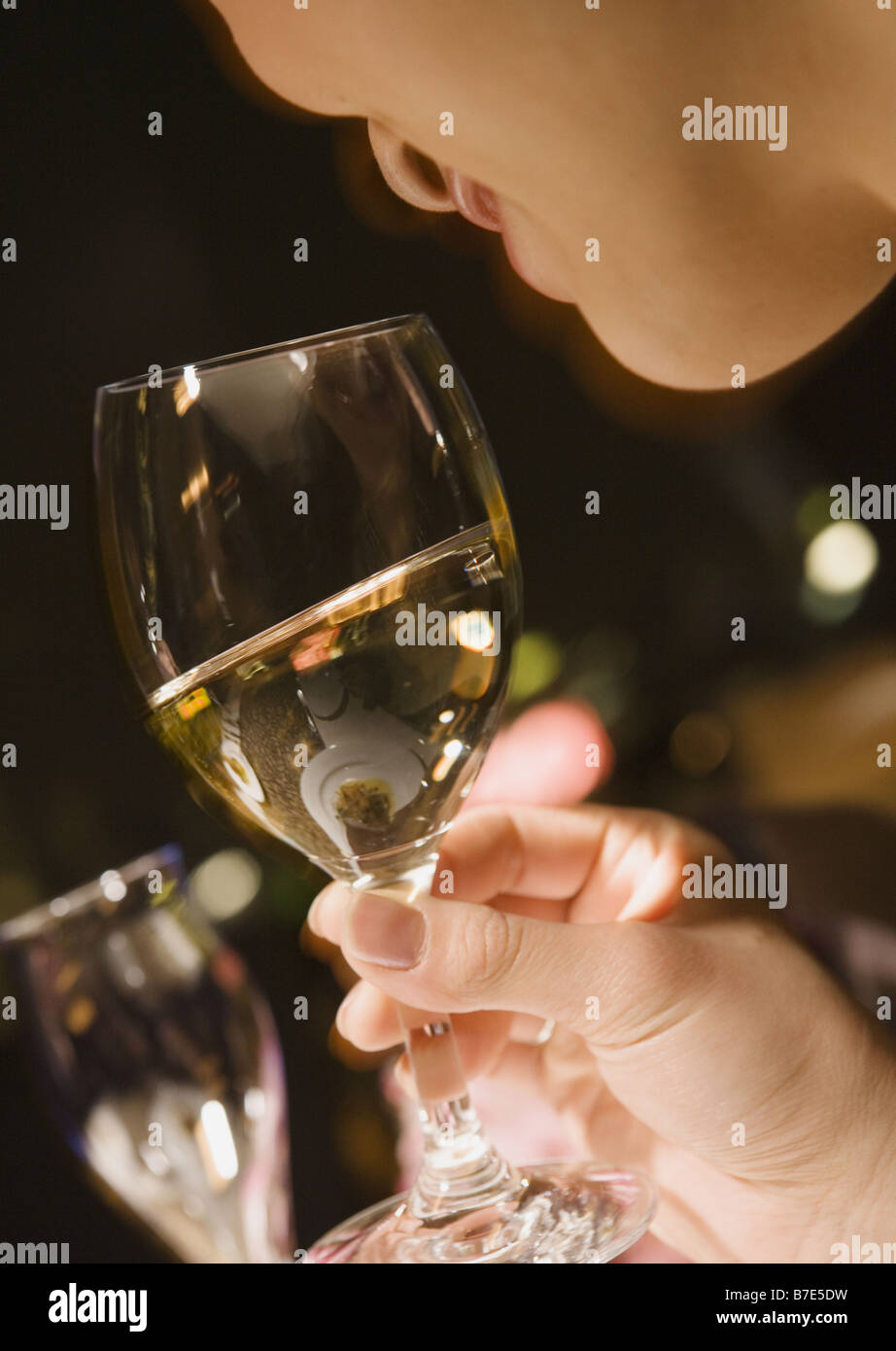Drinking white wine Stock Photo - Alamy