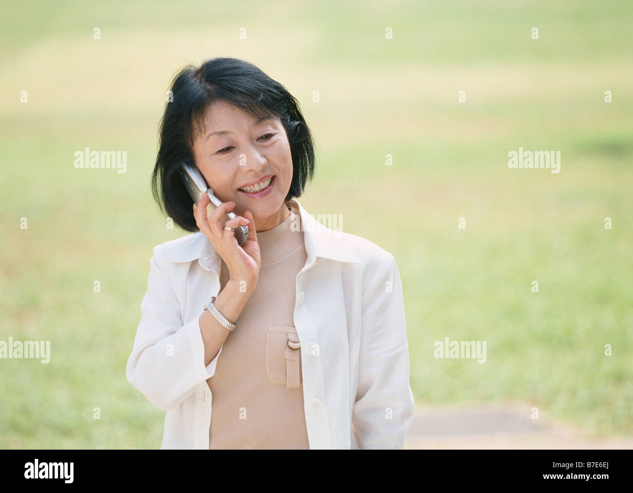 Woman going park phone summer hi-res stock photography and images - Alamy
