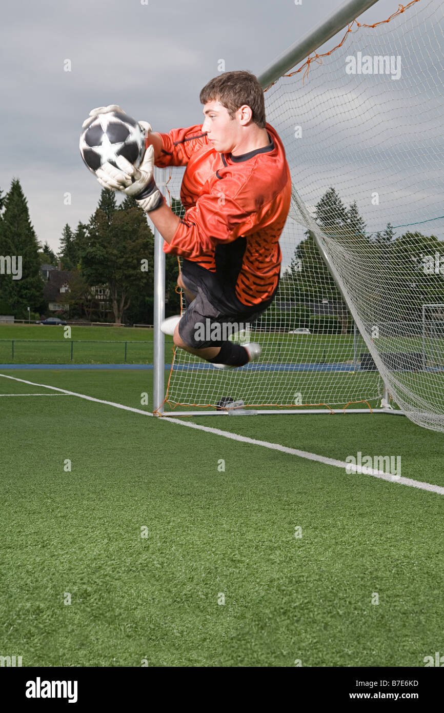 Goalkeeper making a save Stock Photo - Alamy