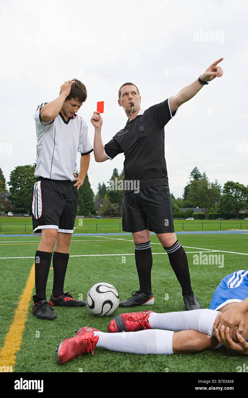 Referee giving red card Stock Photo - Alamy