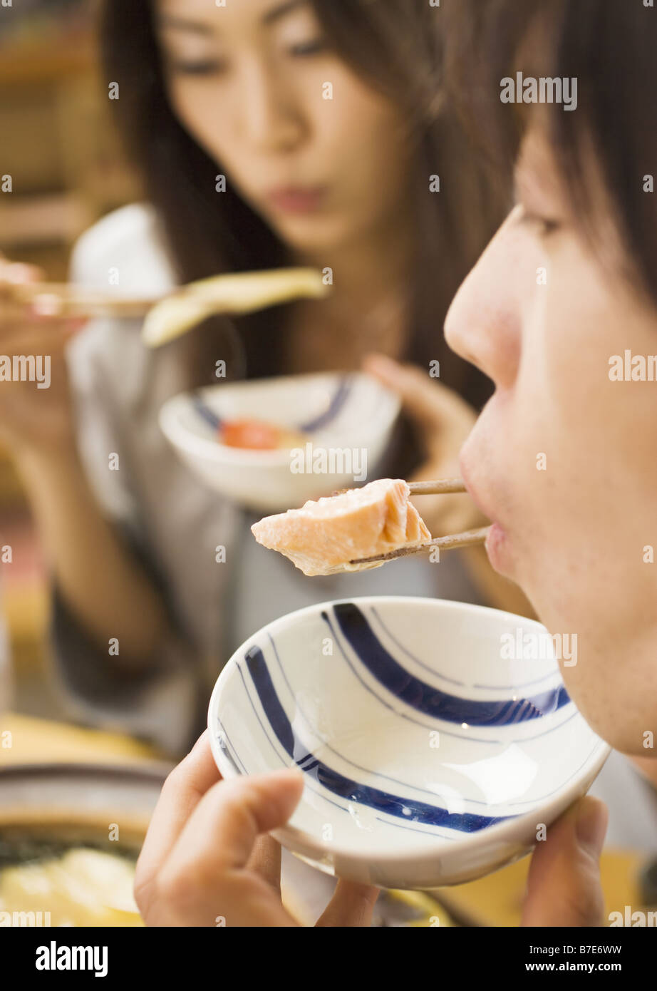 Couple Eating Japanese Style Chowder Stock Photo - Alamy