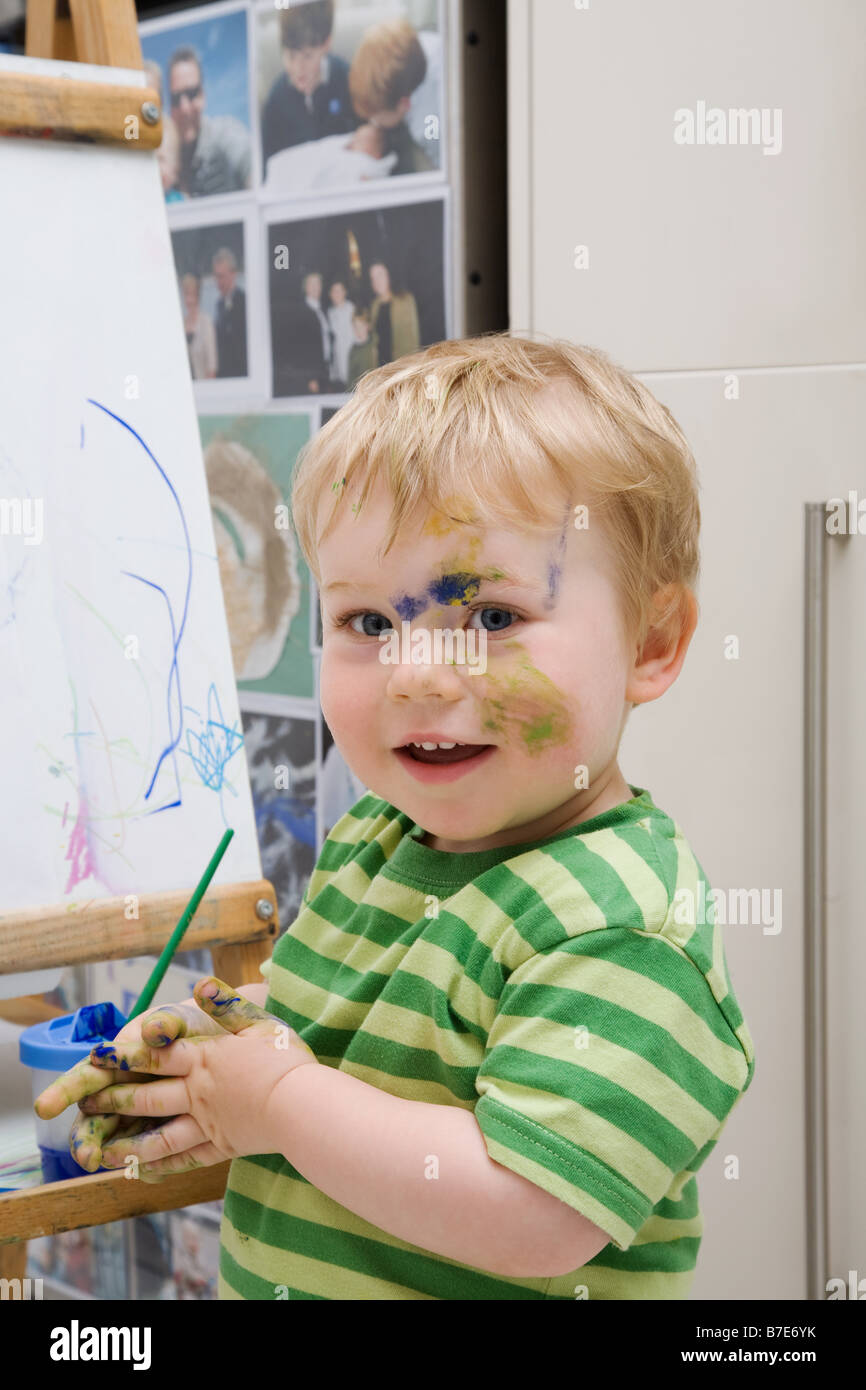 Little boy with paint Stock Photo - Alamy