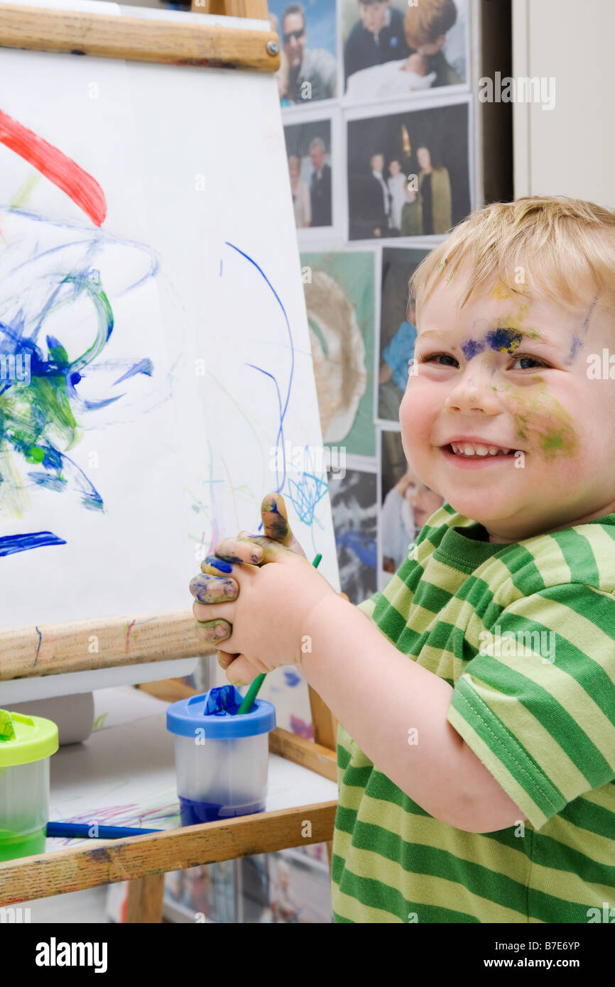 Little boy with paint Stock Photo - Alamy