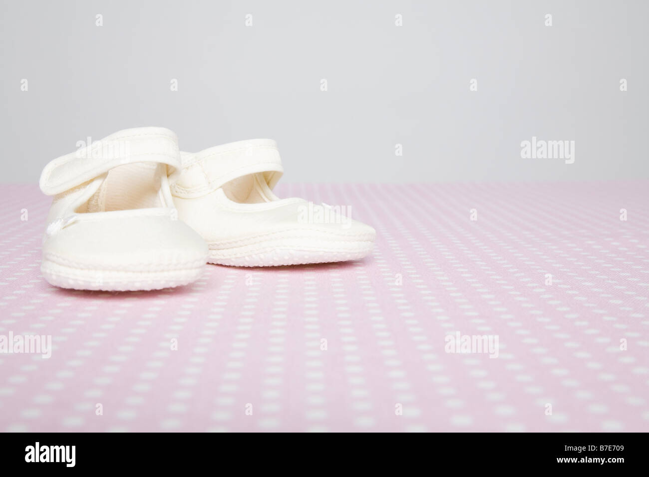 Cutout baby shoes hi-res stock photography and images - Alamy