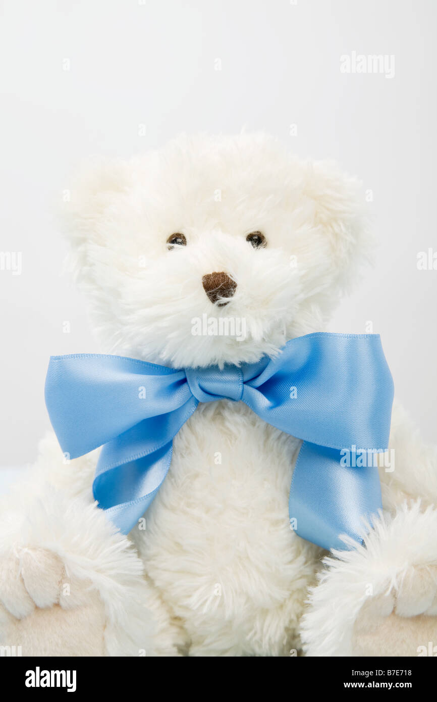 Teddy bear with a bow Stock Photo - Alamy