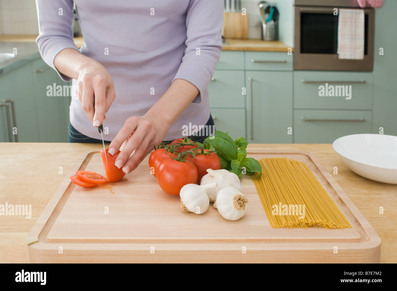 Cutting Up Tomatoes High Resolution Stock Photography and Images - Alamy