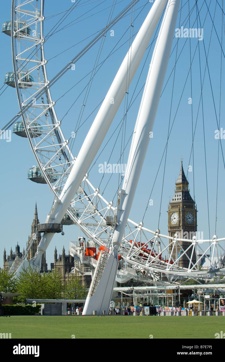 A view of Big Ben clock Tower through the spokes of the London Eye in ...