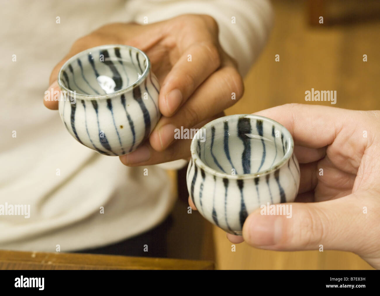 Hand sake hi-res stock photography and images - Alamy