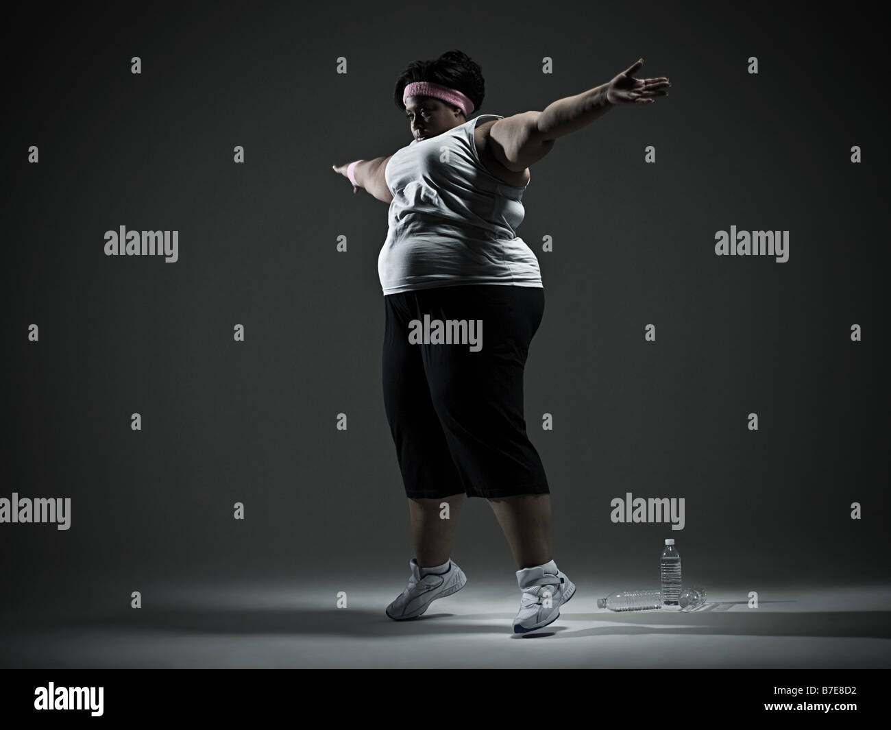 Overweight woman exercising Stock Photo - Alamy