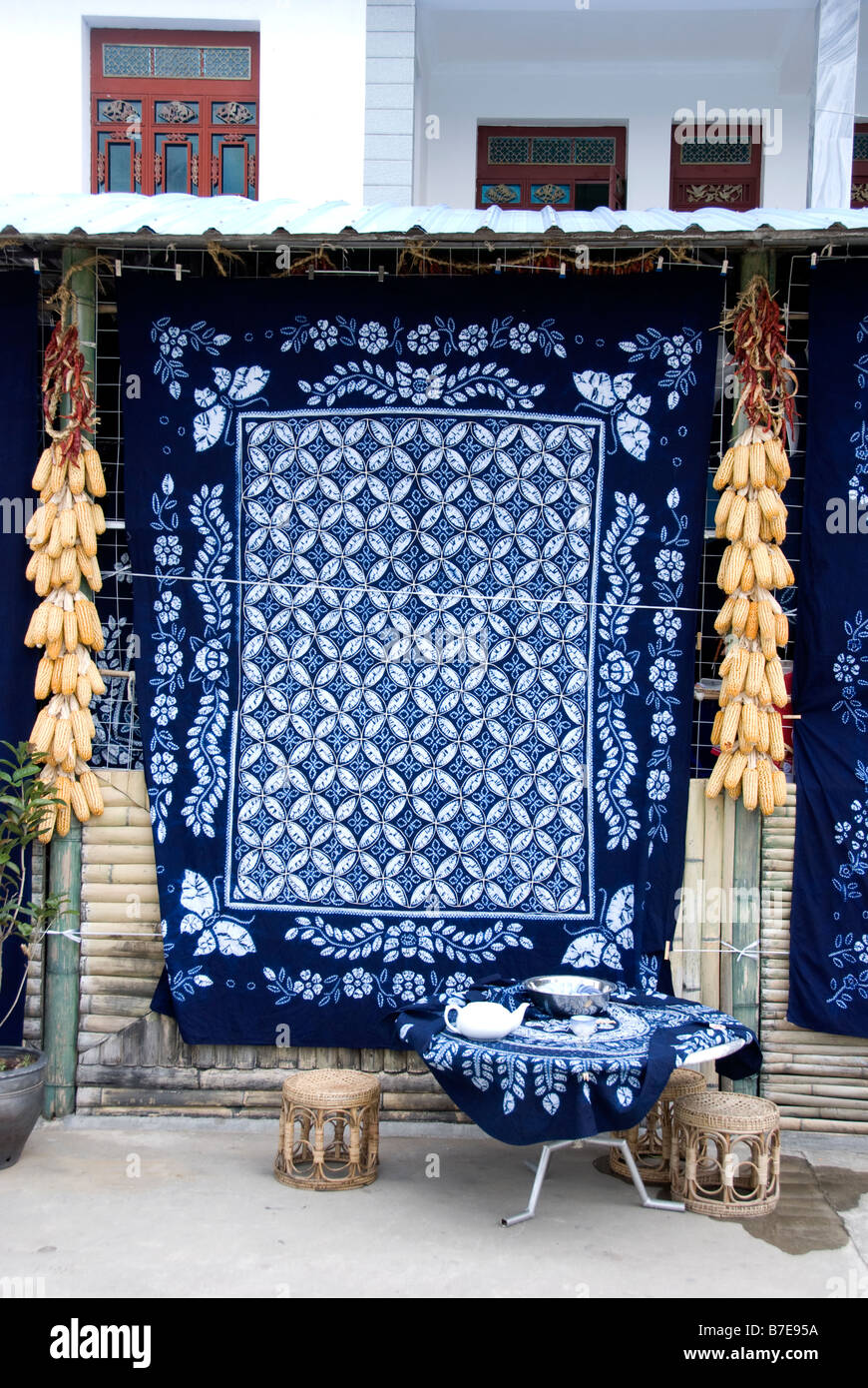 Two pieces of tie-dye cloth in the traditional blue colour produced by ...