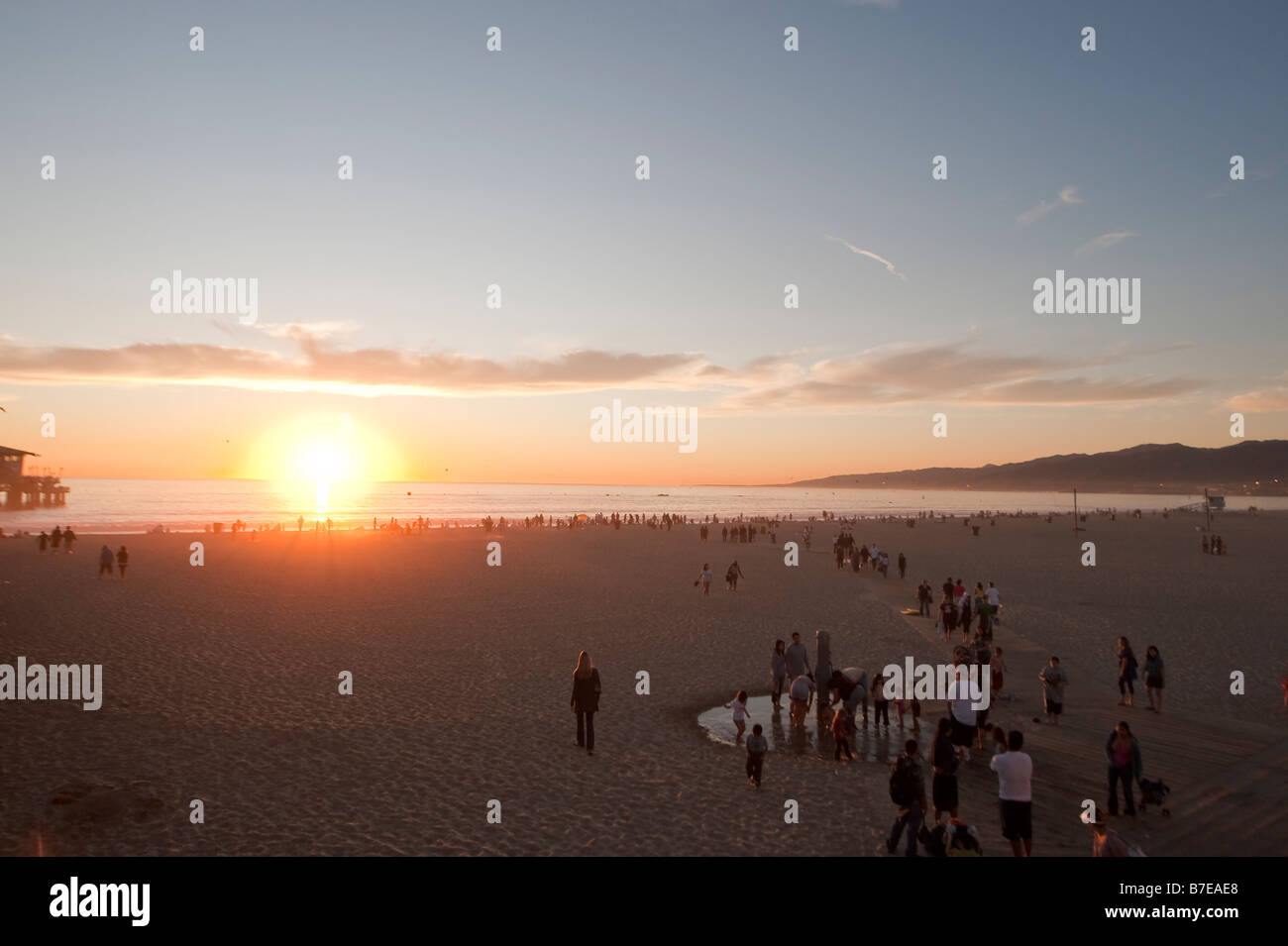 People at the beach at the Santa Monica Pier in southern California ...