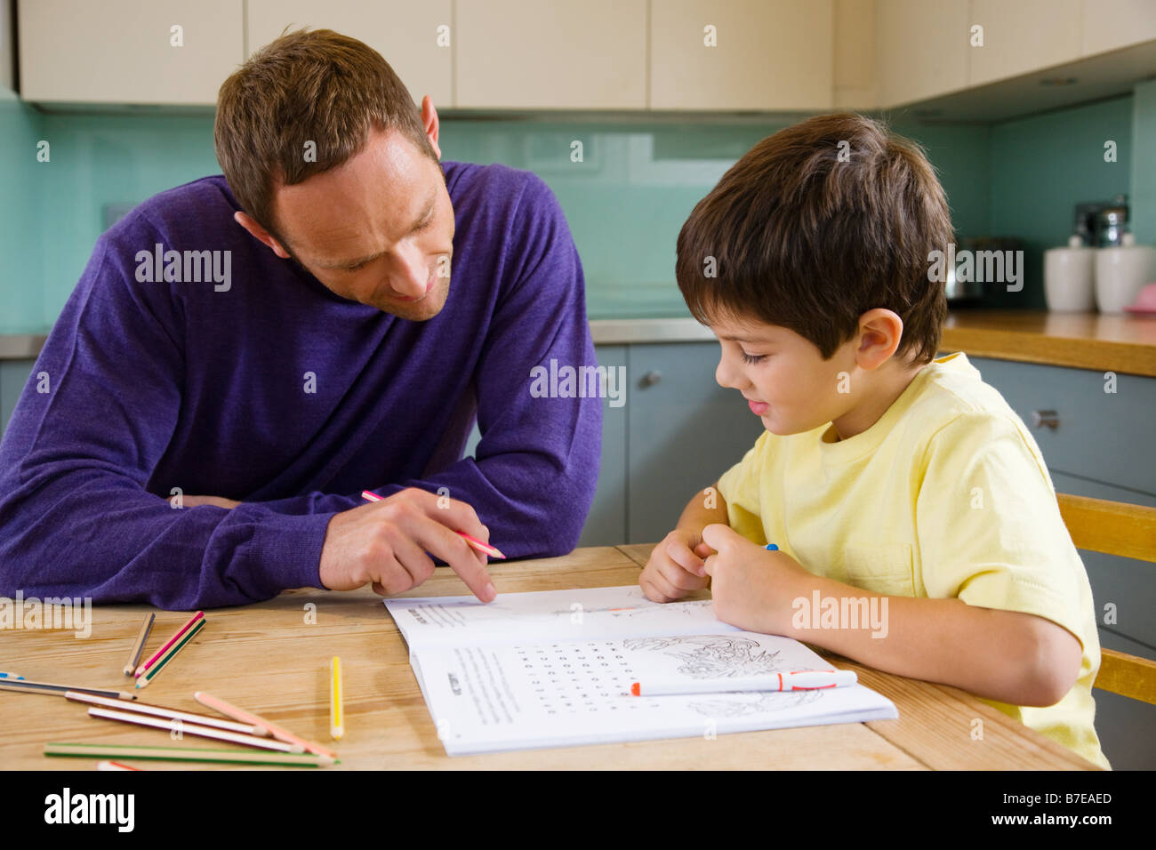 Father paying attention to son hi-res stock photography and images - Alamy