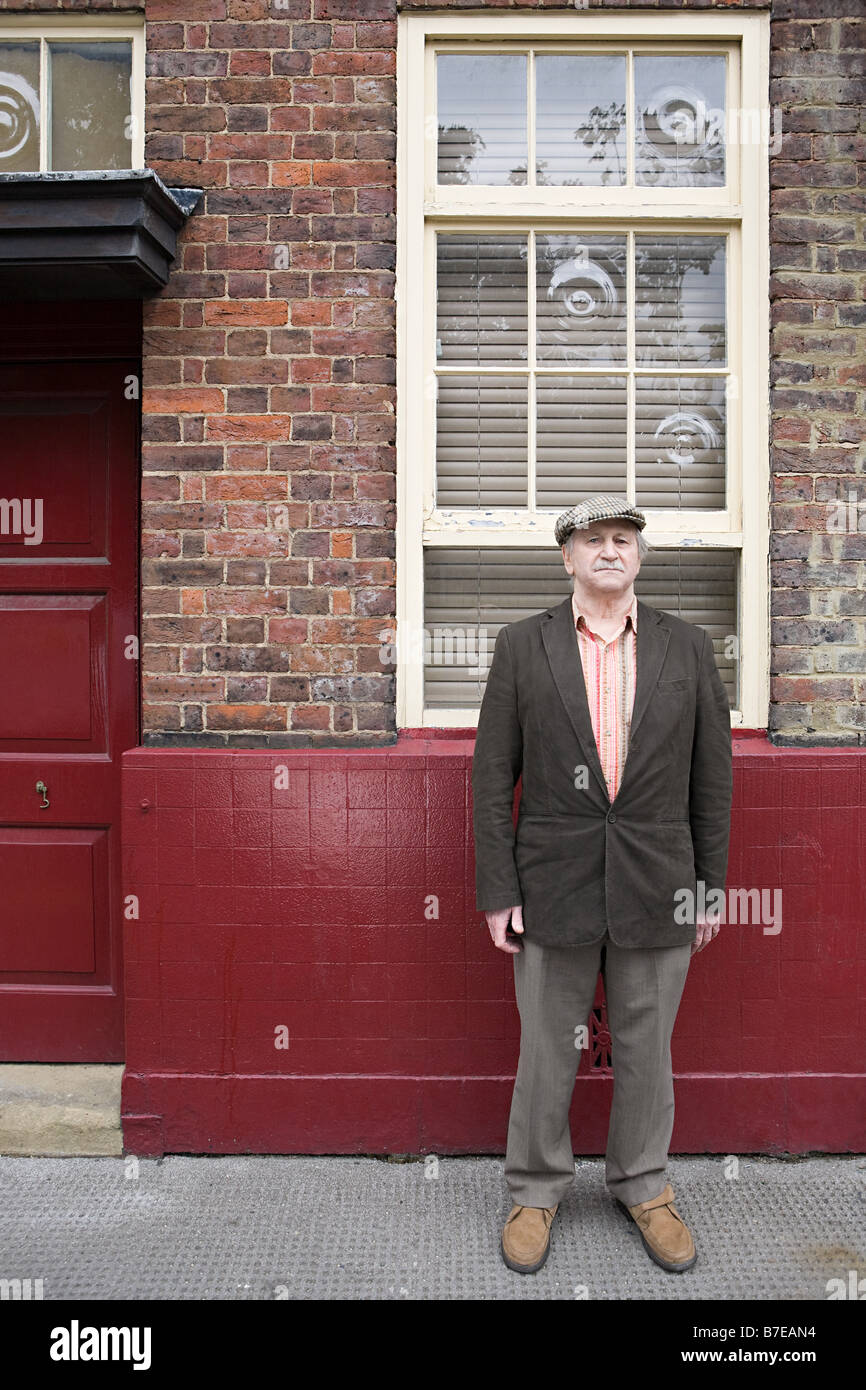 Man outside building hi-res stock photography and images - Alamy