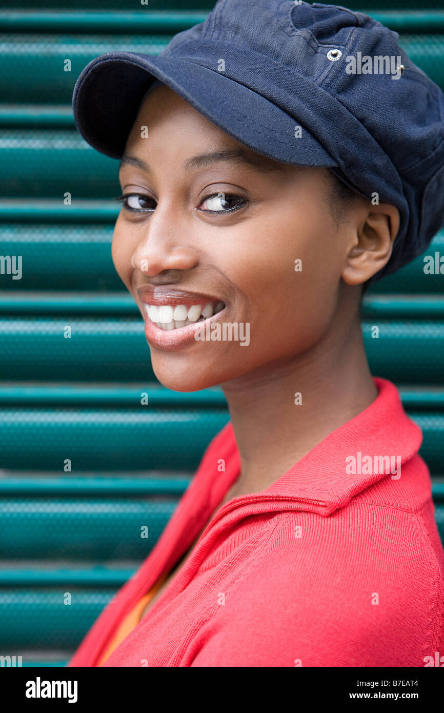 Young woman wearing cap Stock Photo - Alamy
