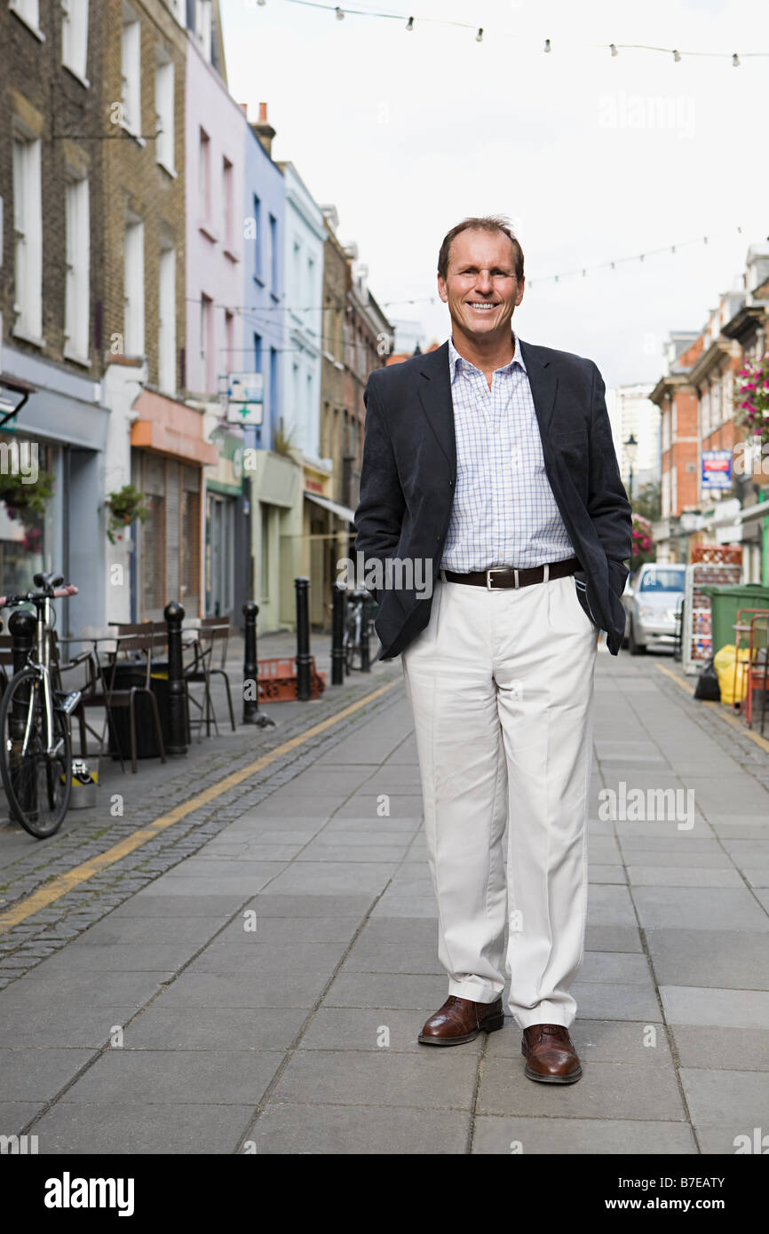 Man standing in street Stock Photo - Alamy