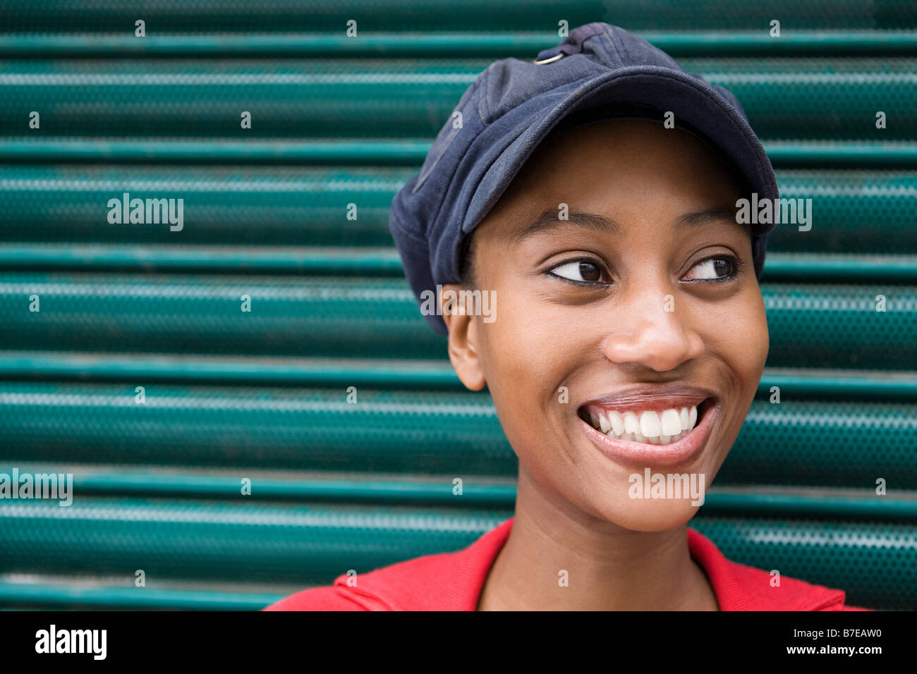 Young woman wearing cap Stock Photo - Alamy