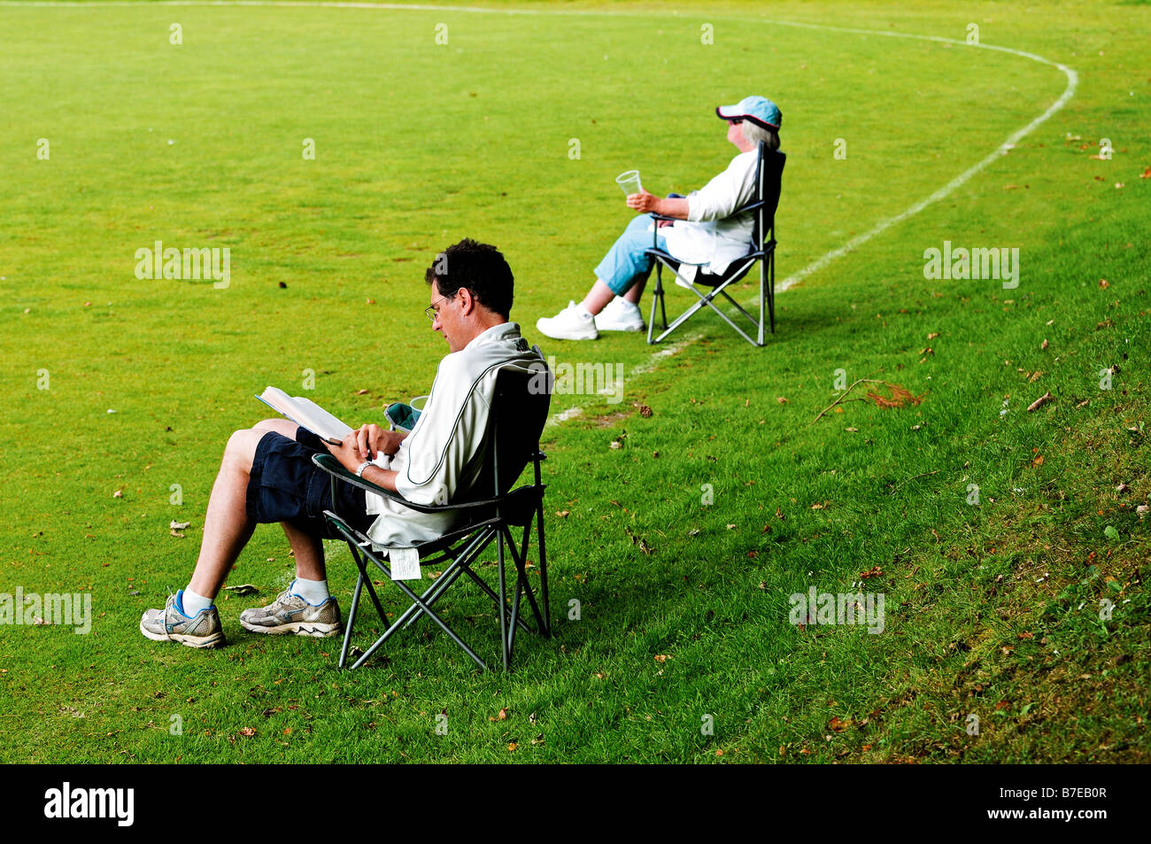 outdoor portrait of spectators in deckchairs Stock Photo - Alamy