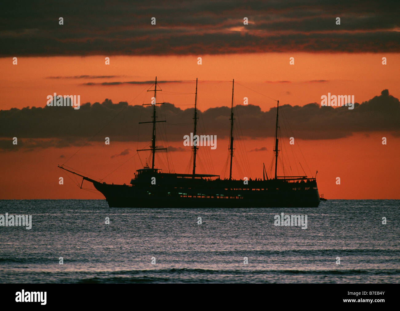 Sunset and Ship Stock Photo - Alamy