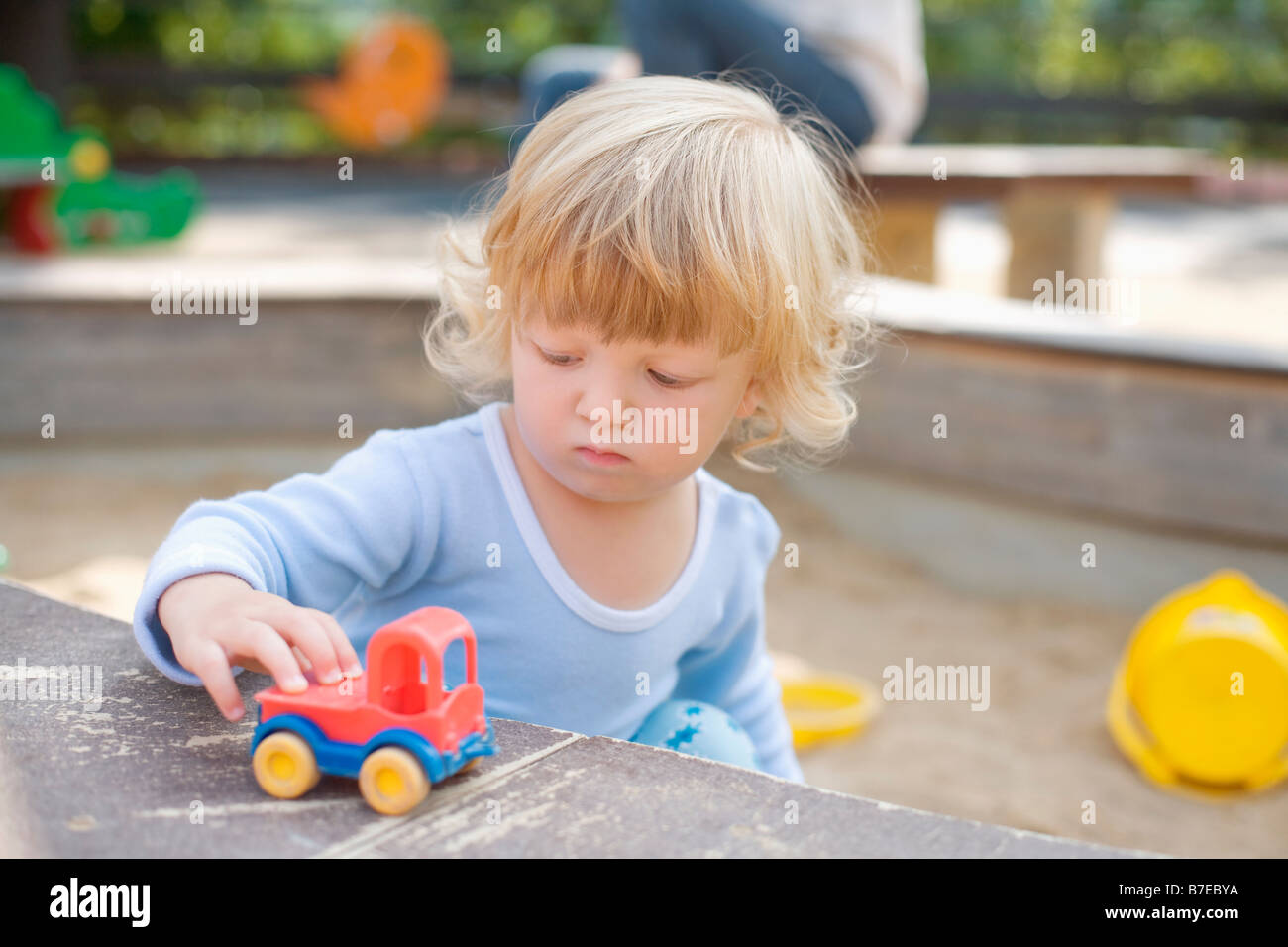 BOY AGE 2 YEARS AT THE PLAYGROUND Stock Photo - Alamy