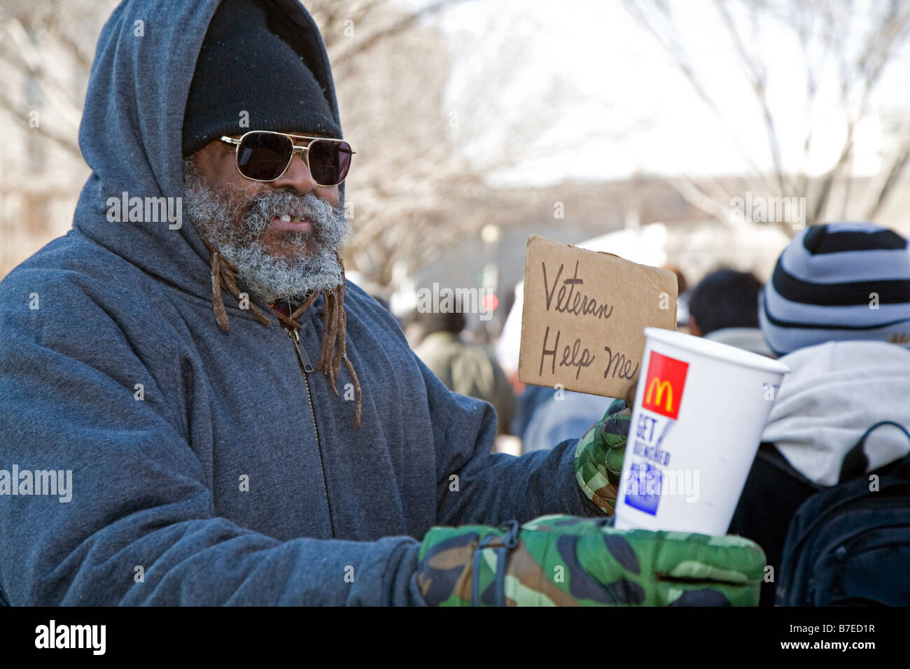 Begging for handouts hi-res stock photography and images - Alamy