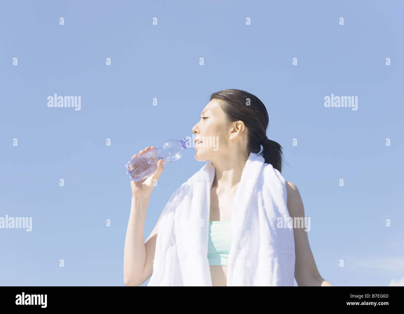 Woman drinking water Stock Photo - Alamy