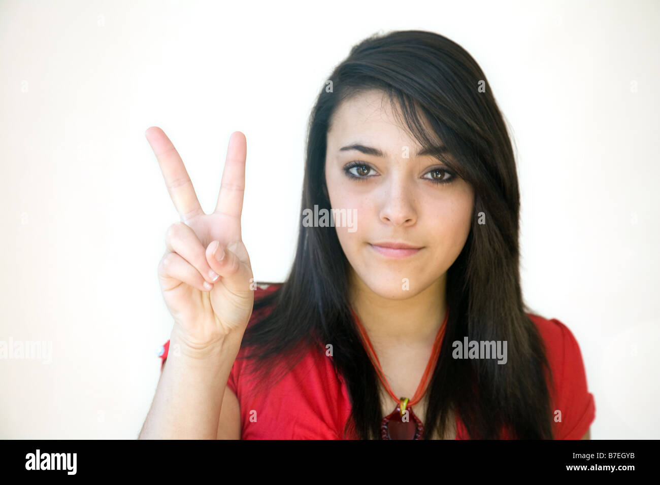 Indian girl with v sign hi-res stock photography and images - Alamy