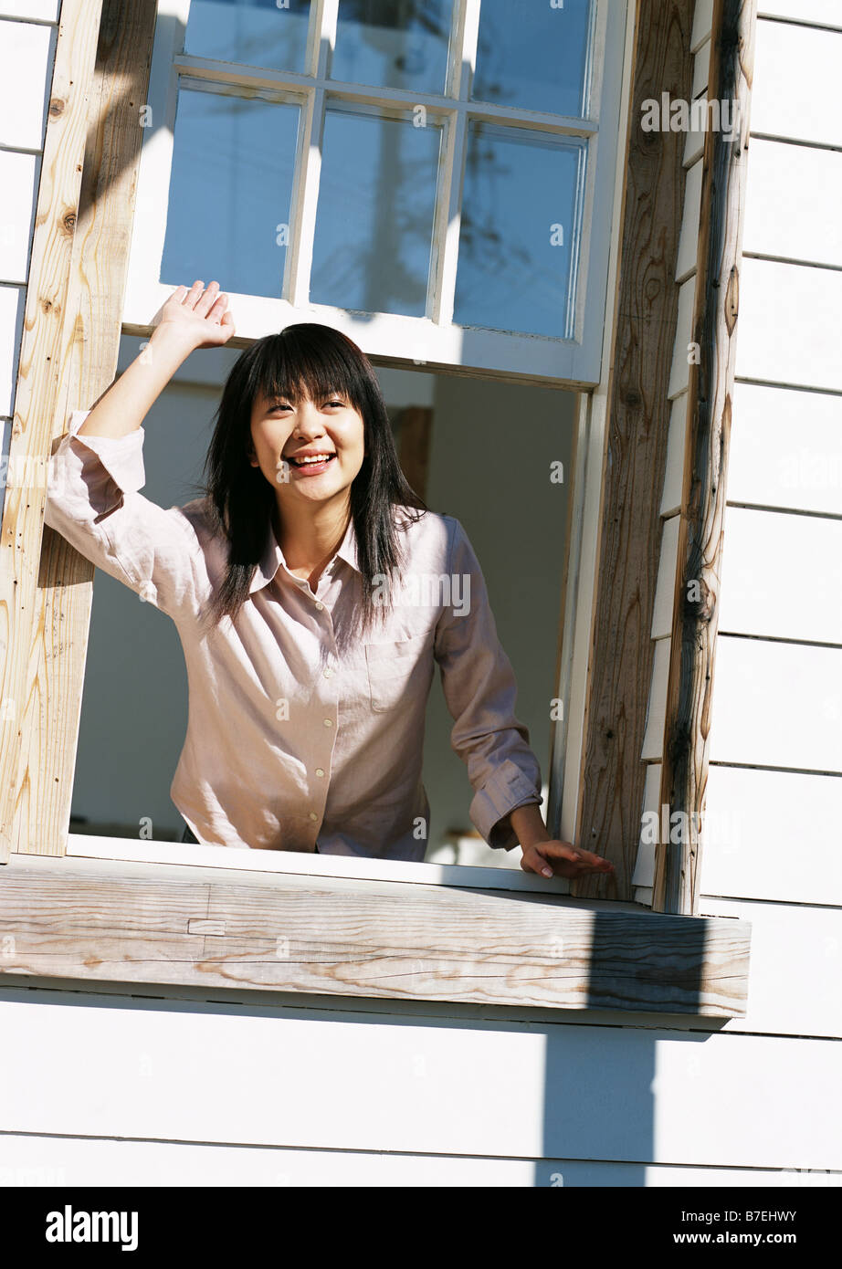 Woman Near Window Stock Photo - Alamy