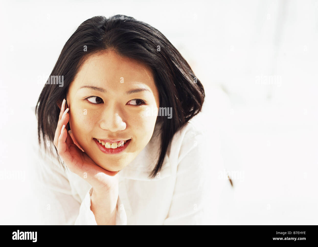 Resting chin on straight hair hi-res stock photography and images - Alamy