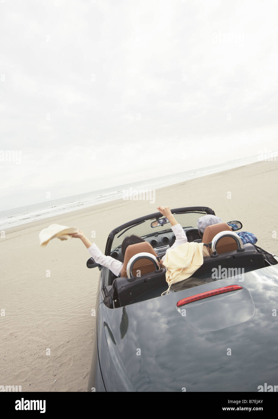 Couple drive car beach hi-res stock photography and images - Alamy