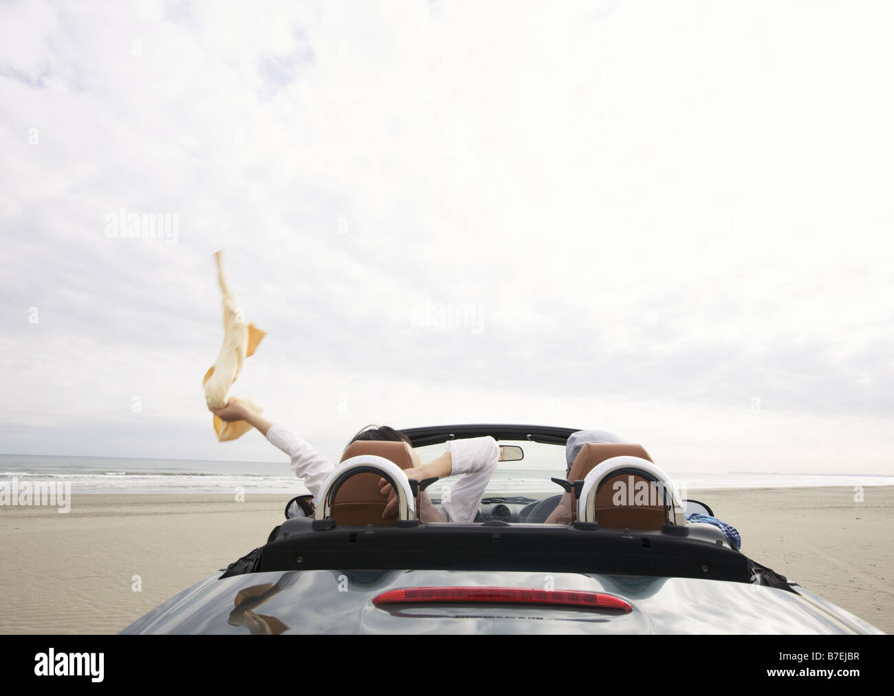 Couple having a drive Stock Photo - Alamy