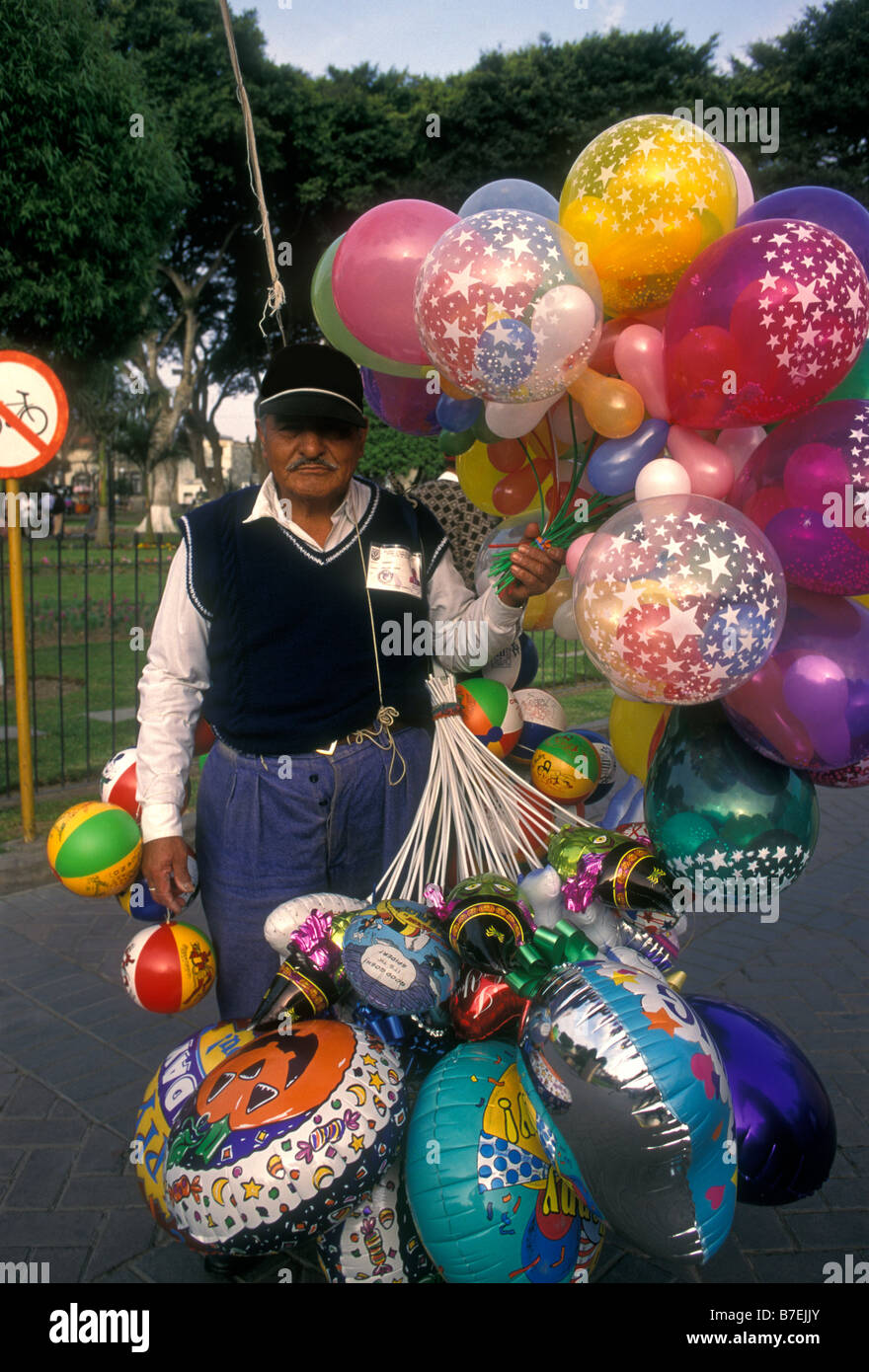 People 1 one male man balloons balloon vendor, Parque Central ...