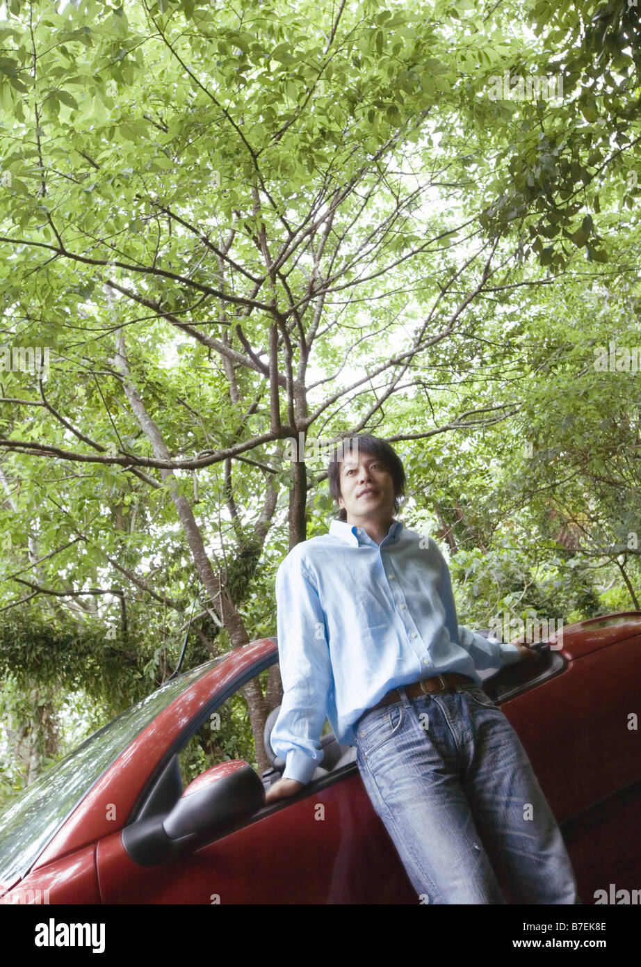 Man standing with his car hi-res stock photography and images - Alamy