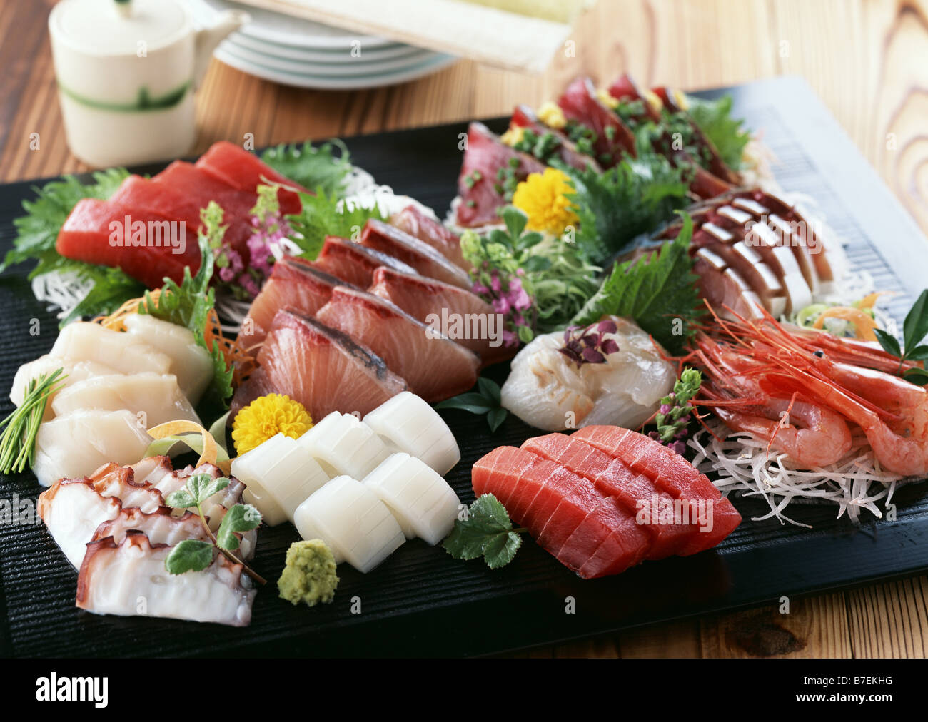 Japanese style assorted sashimi dish laid over crushed ice Stock Photo ...