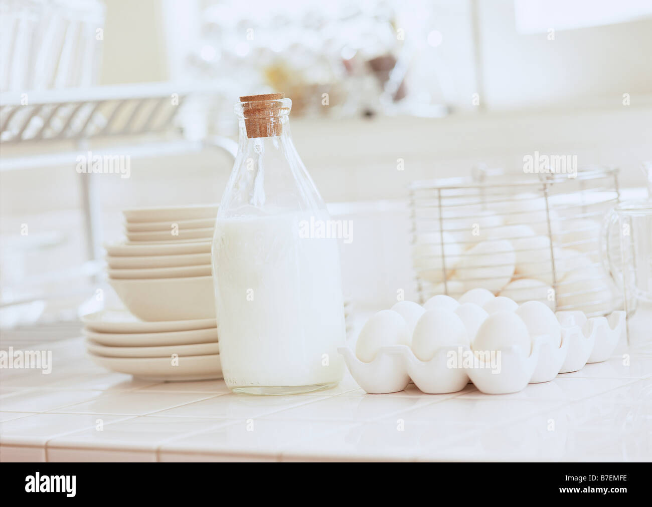 Eggs and milk on kitchen counter Stock Photo - Alamy